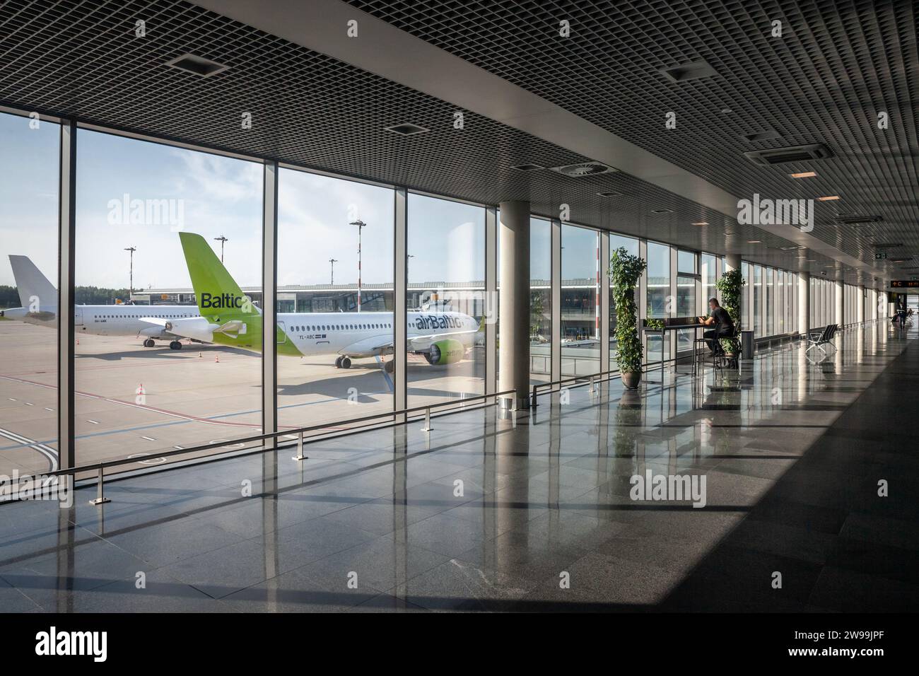 Picture of an Airbus A220 Air Baltic waiting for departure in Riga ...
