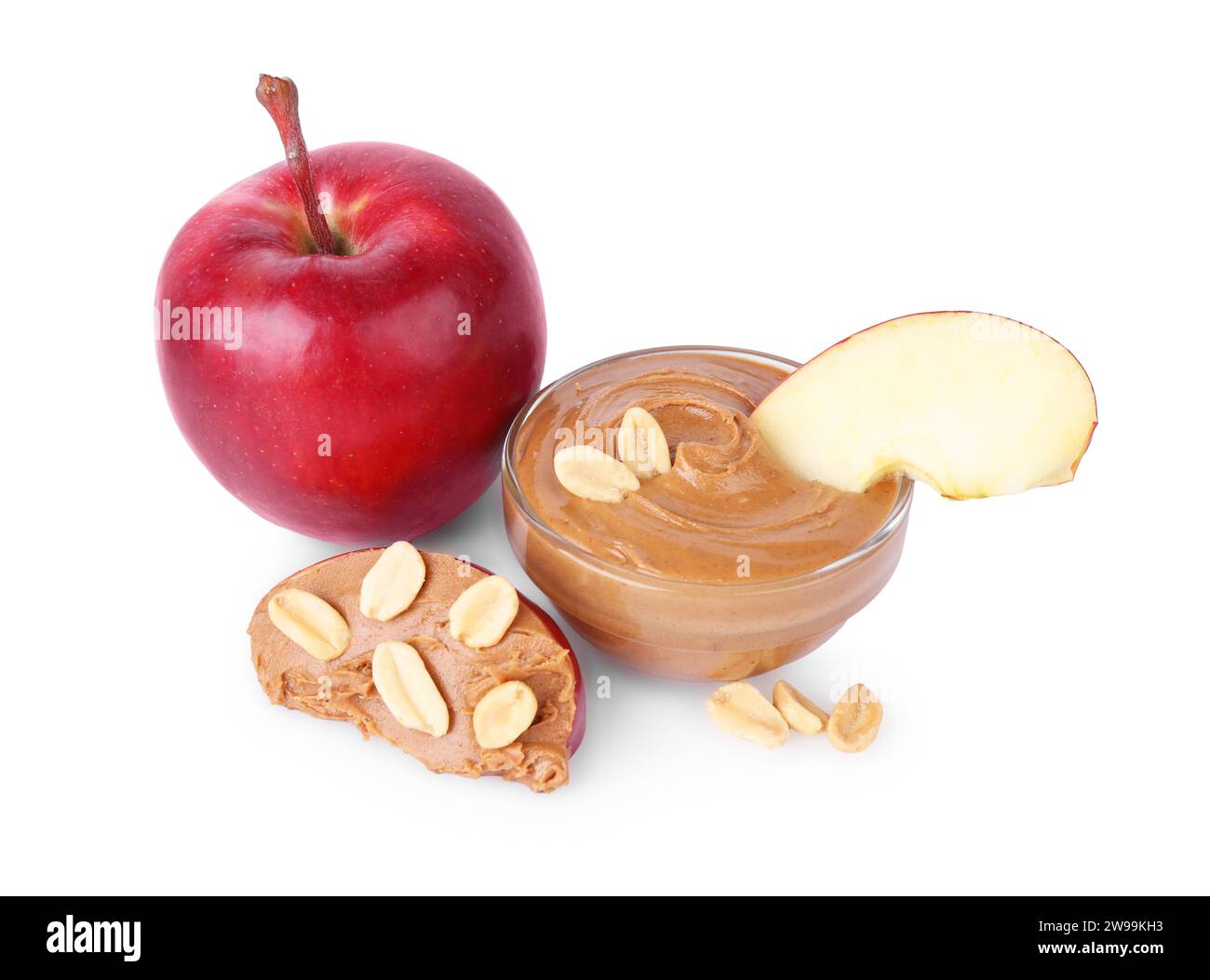 Slices of fresh apple with peanut butter, fruit and nuts isolated on ...