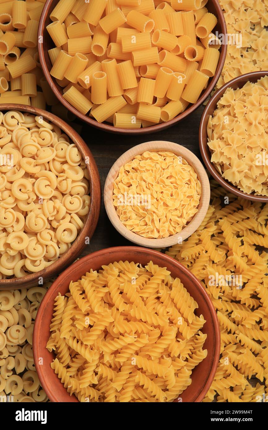 Different types of pasta on table, flat lay Stock Photo - Alamy
