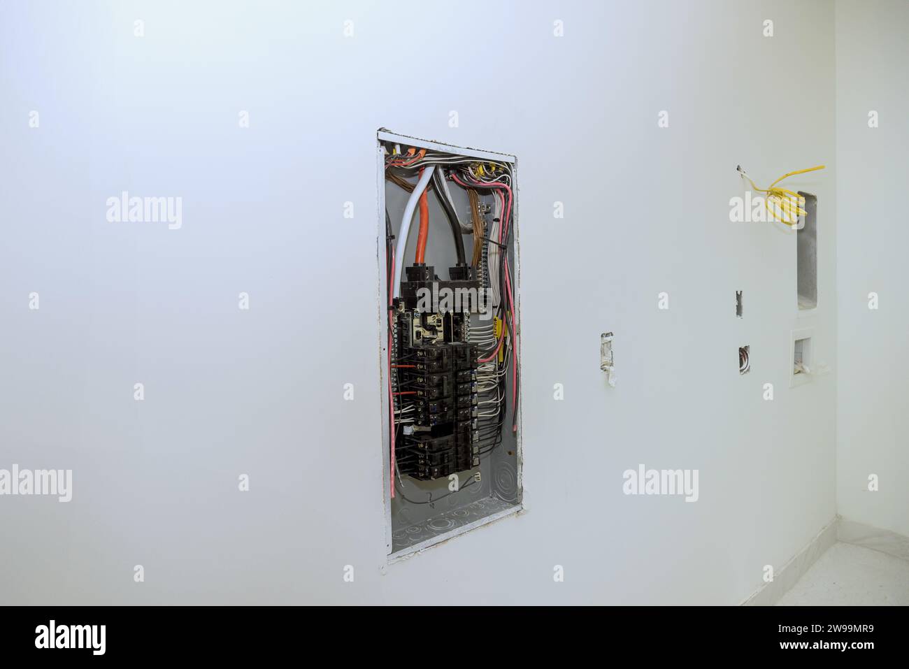 Electrical power control panel switch box is mounted to wooden frame ...