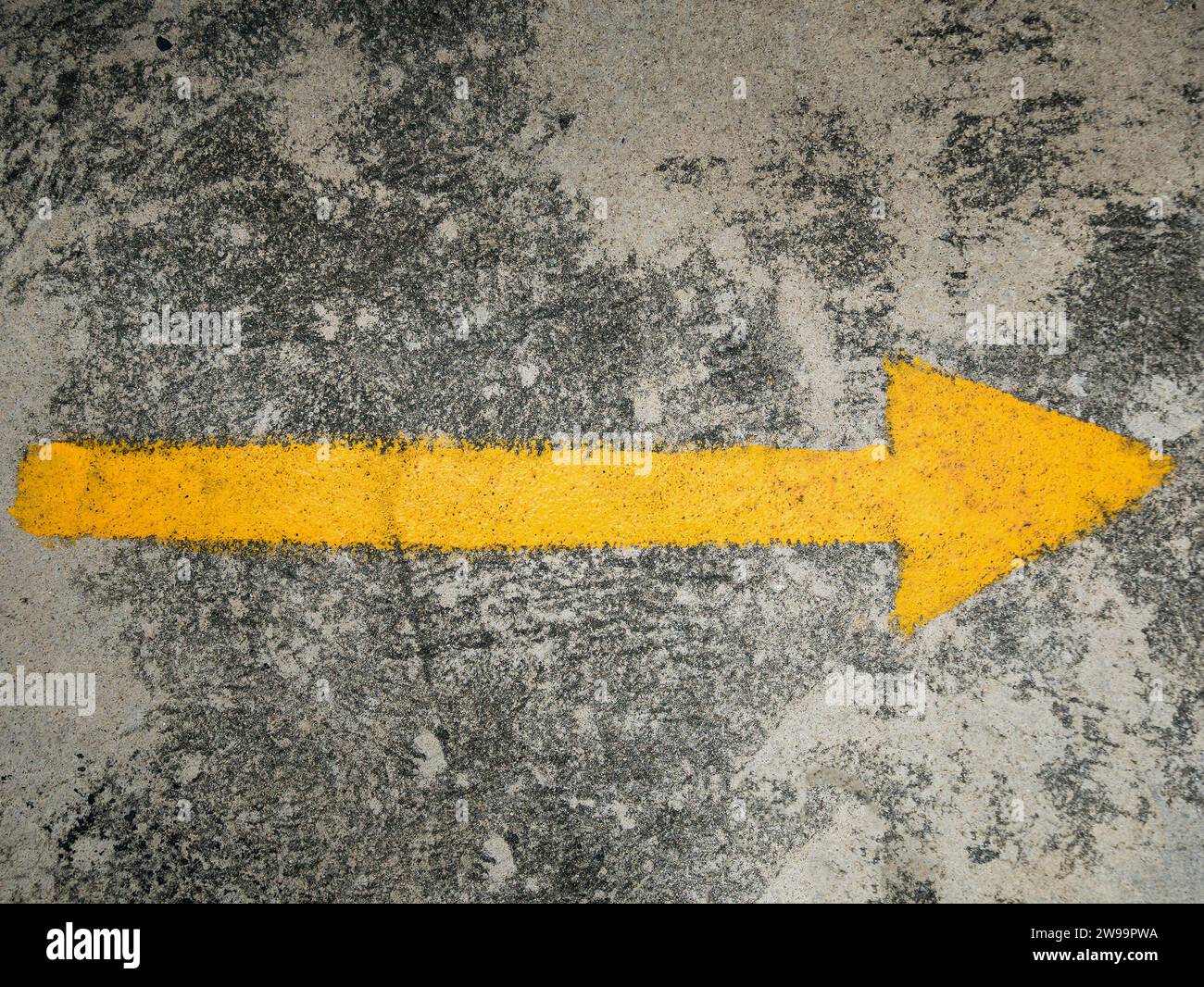 traffic direction arrow on the road, turn right sign Stock Photo - Alamy