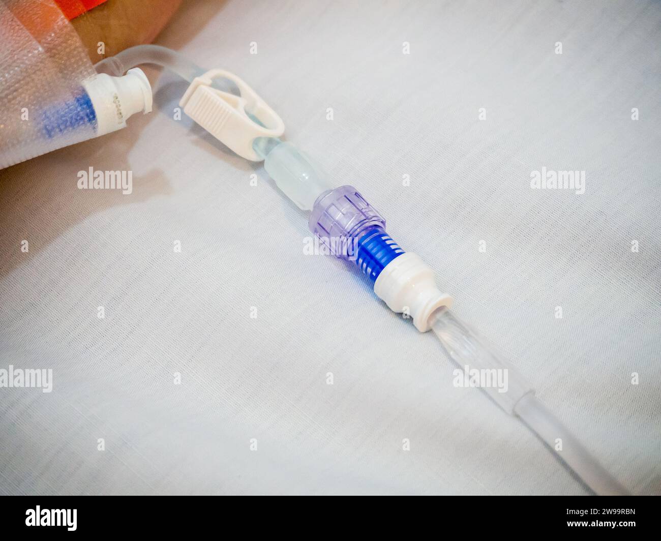Asian woman patient hand on IV drip with saline solution, fluid ...