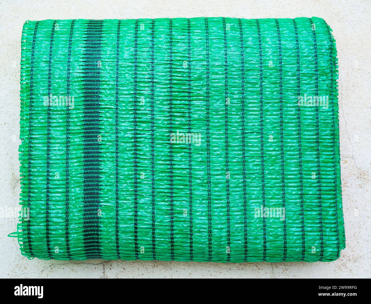 Green Shading Net on the floor ready to install Stock Photo - Alamy