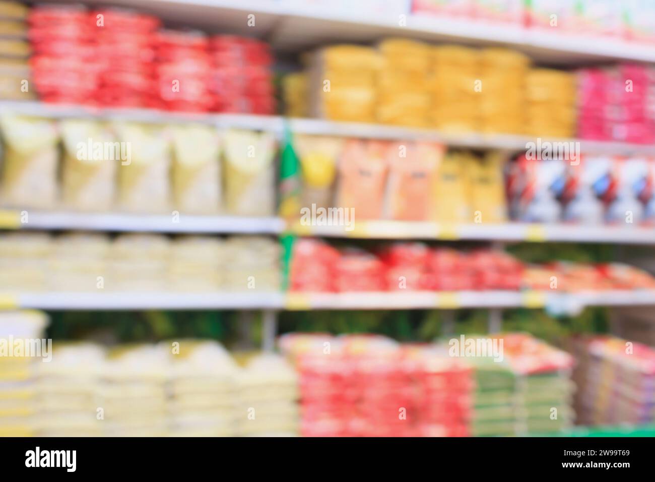 supermarket with rice shelves blur background Stock Photo - Alamy