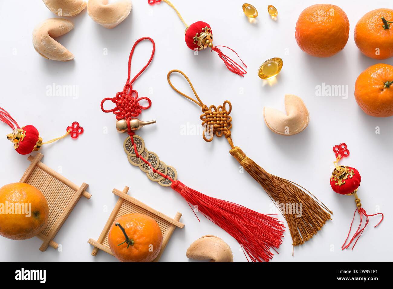 Composition with lucky talismans, fortune cookies, tangerines and ...