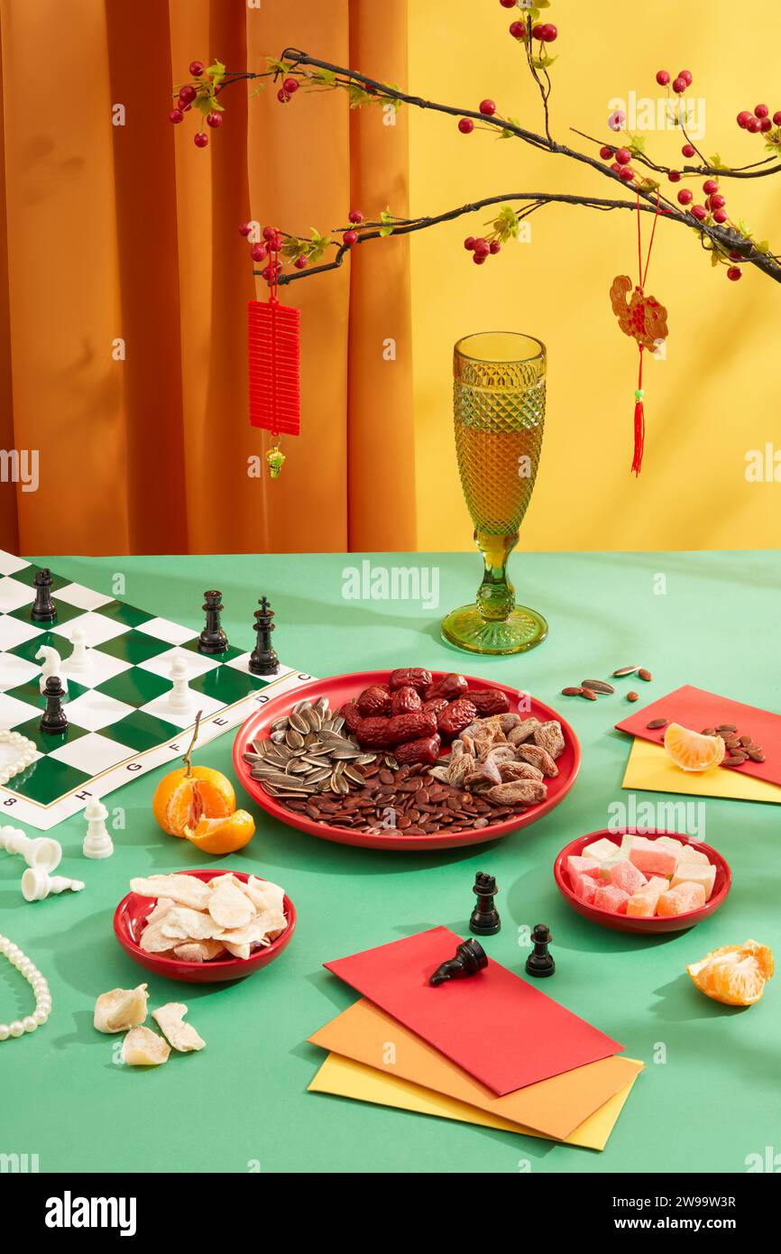 Close-up of a plate of ginger jam, a plate of colorful gummy candy, a ...