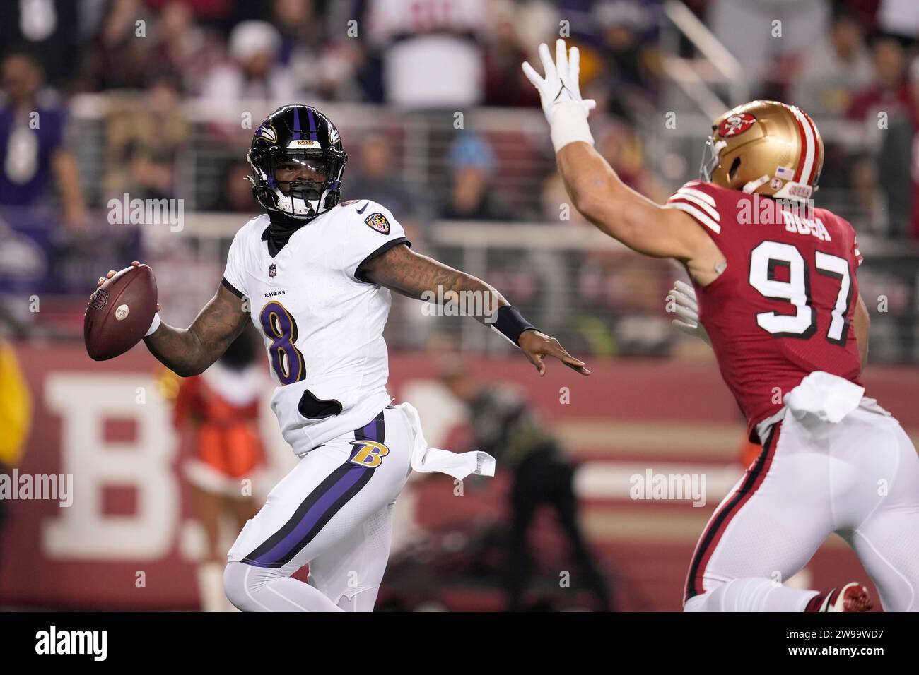 Baltimore Ravens quarterback Lamar Jackson (8) scrambles from San ...
