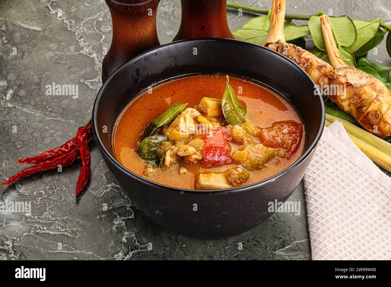 Thai traditional Tom Yum spicy soup with chicken Stock Photo - Alamy