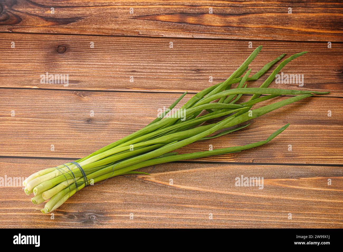 Raw young spring green onion heap Stock Photo - Alamy