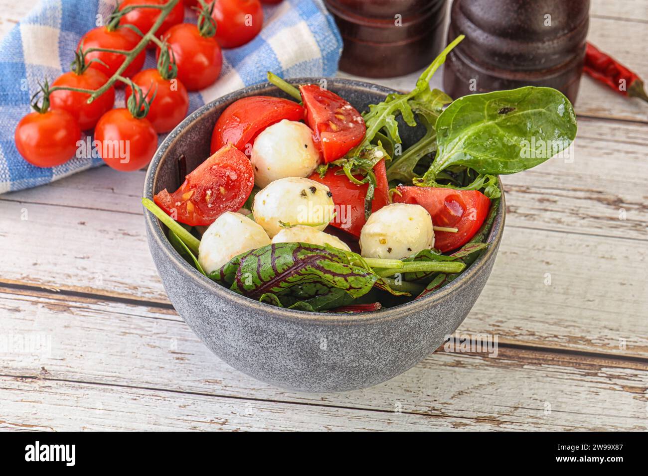 Mix salad with mini mozzarella and tomato Stock Photo - Alamy