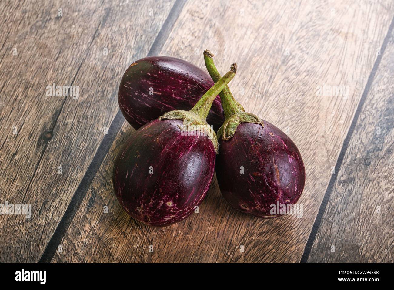 Raw smal asian baby violet eggplant Stock Photo - Alamy
