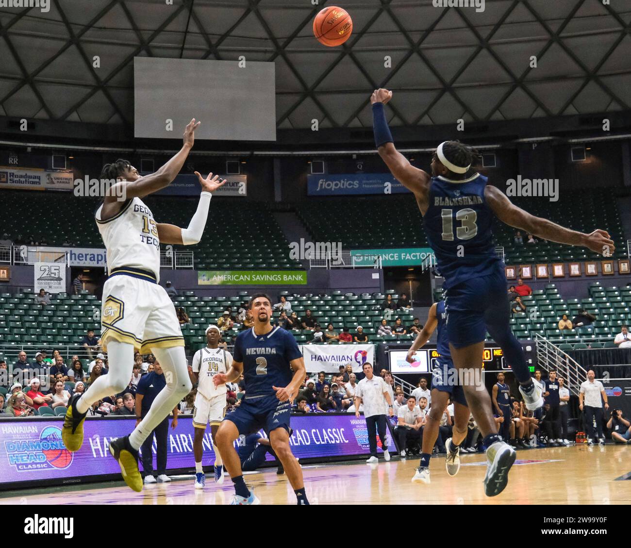 December 24, 2023: Nevada guard Kenan Blackshear (13) tries to deflect ...