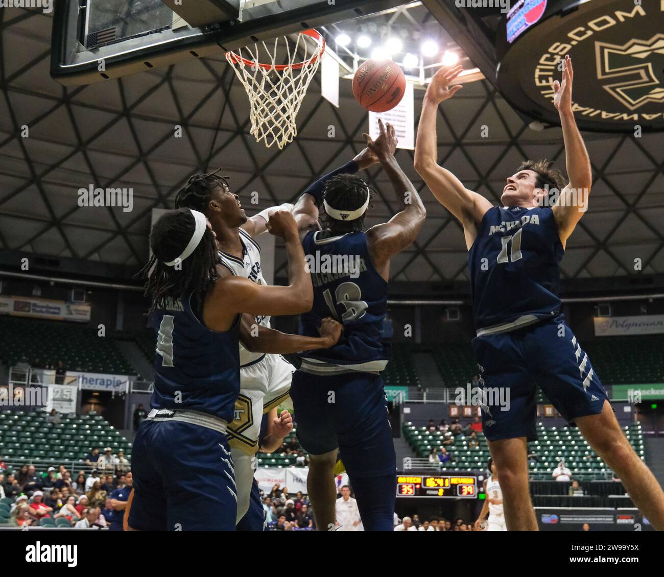 Honolulu, Hawaii, USA. 24th Dec, 2023. Nevada forward Nick Davidson (11 ...