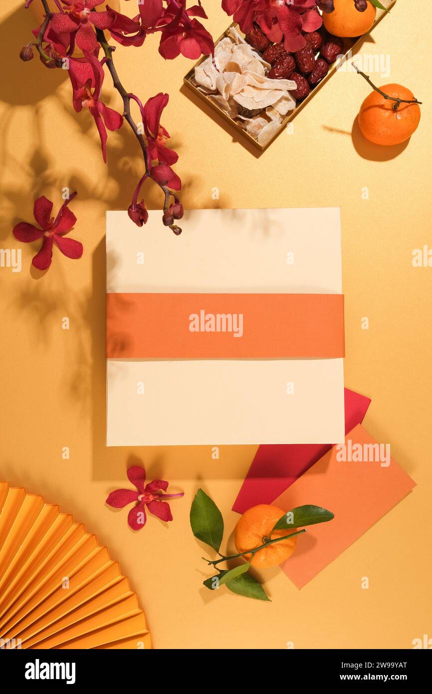 A Tet gift box, red orchids, tangerines, jam, jujubes, lucky money ...