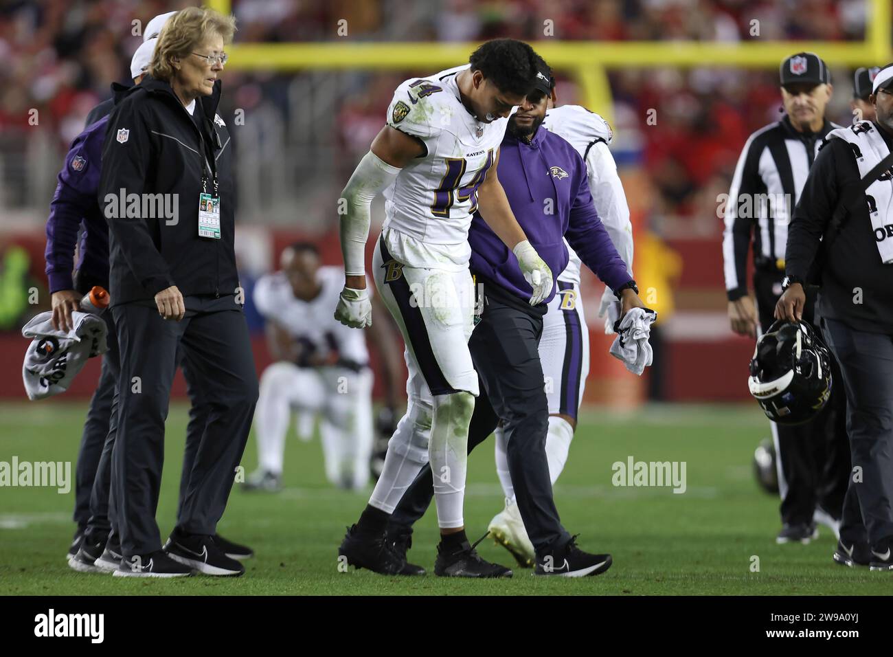 Baltimore Ravens safety Kyle Hamilton (14) walks off the field with ...