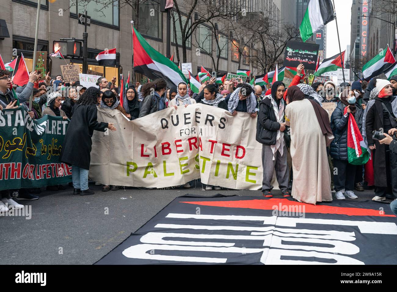 Hundreds of pro-Palestinian protesters rally on Rockefeller plaza and ...