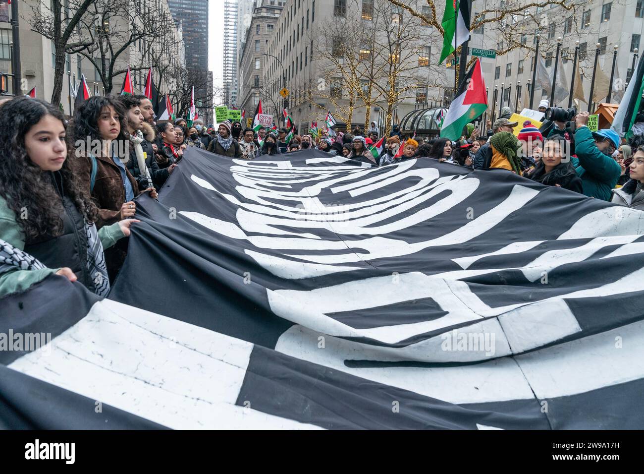 Hundreds of pro-Palestinian protesters rally on Rockefeller plaza and ...