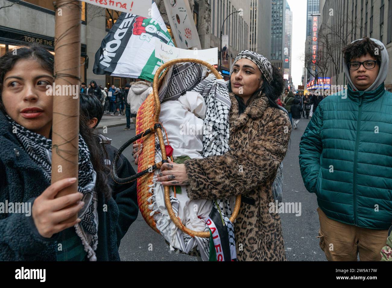Hundreds of pro-Palestinian protesters rally on Rockefeller plaza and ...
