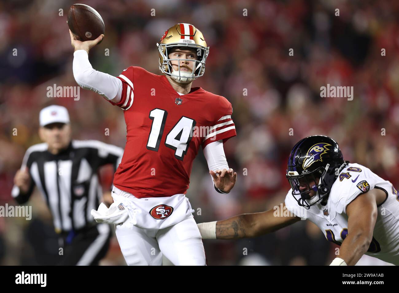 San Francisco 49ers quarterback Sam Darnold (14) passes in front of ...