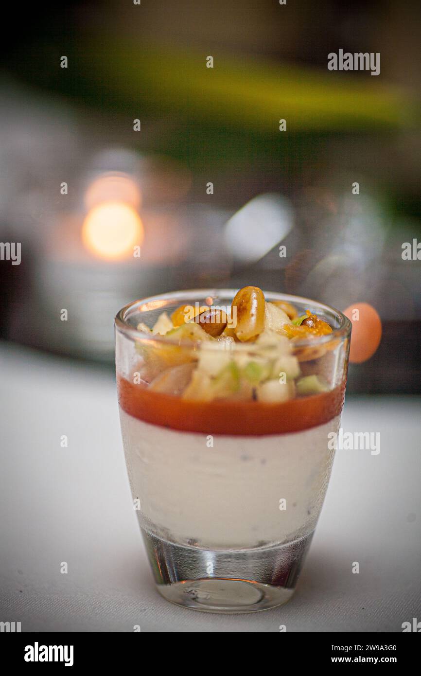 This image captures the sophisticated presentation of a verrine ...