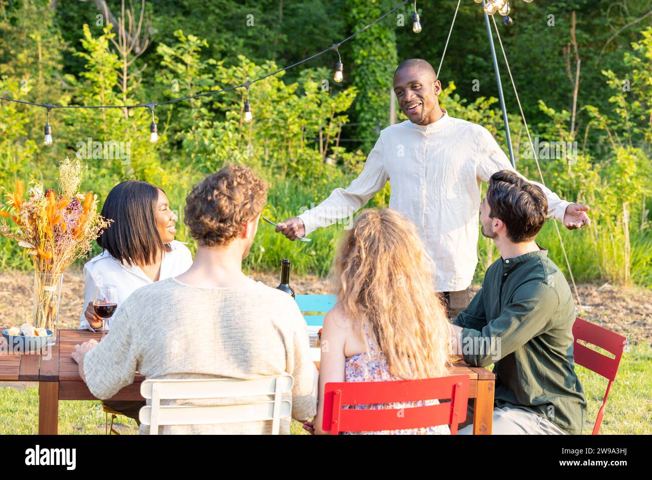 Seated guests engage hi-res stock photography and images - Alamy