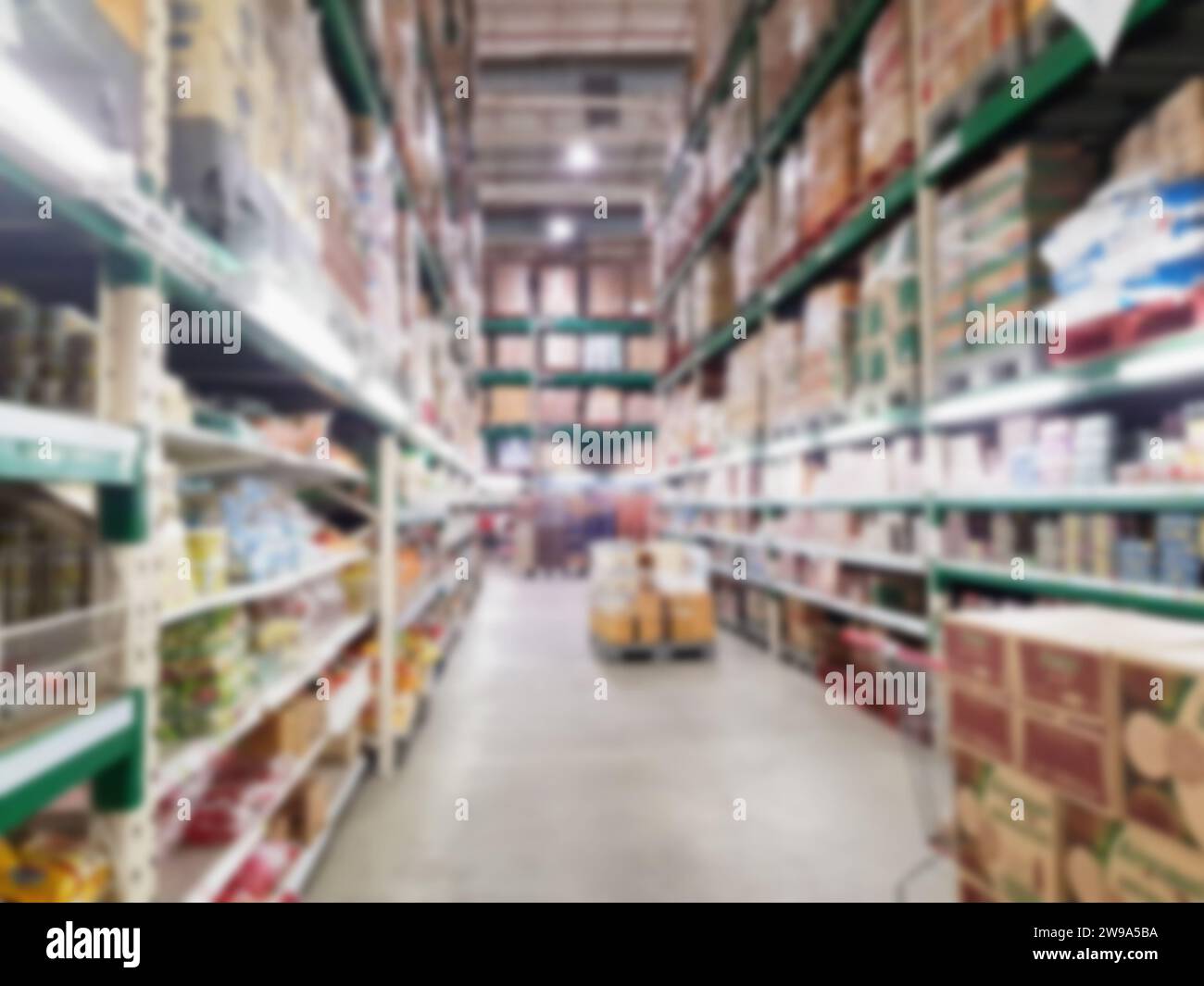 Blur supermarket or warehouse aisle background Stock Photo - Alamy