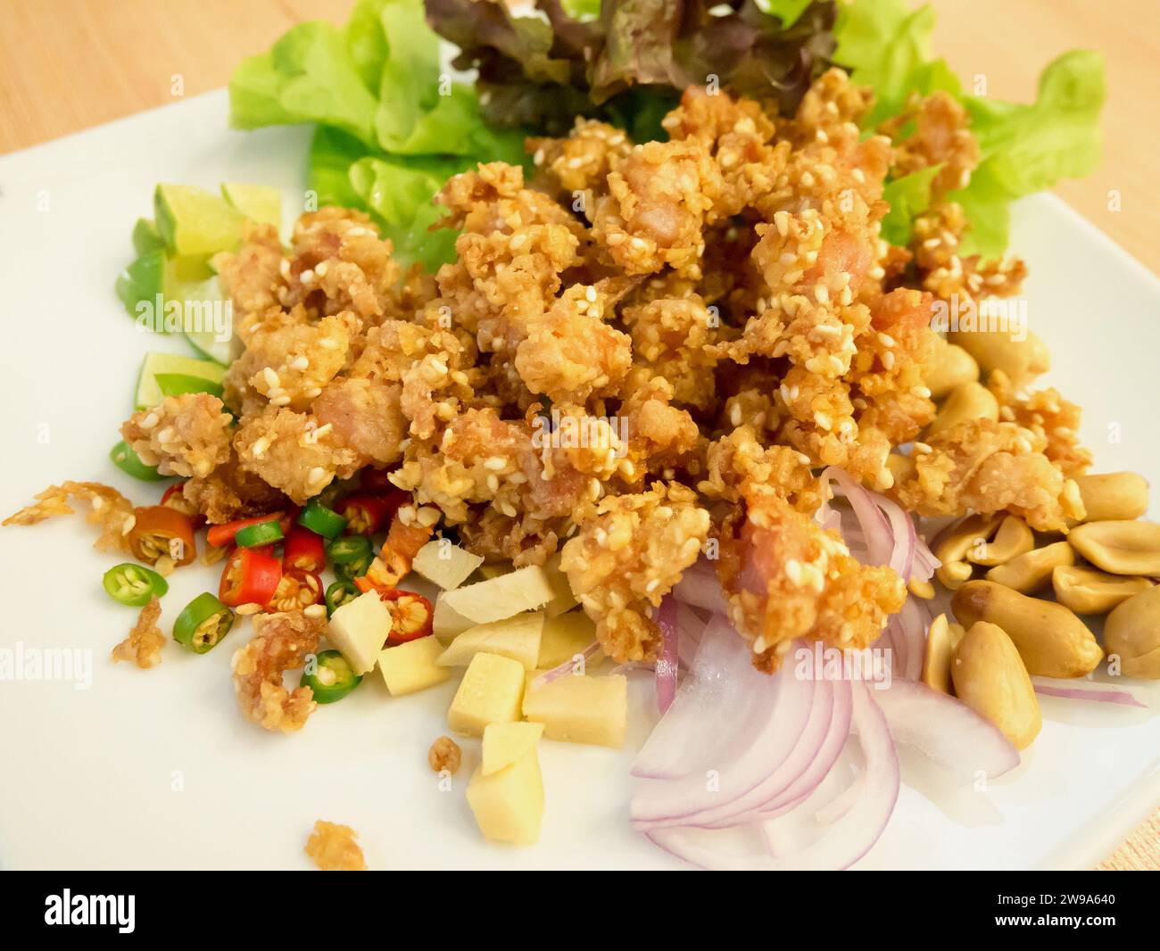 fermented chicken tendons fried, thai food Stock Photo - Alamy