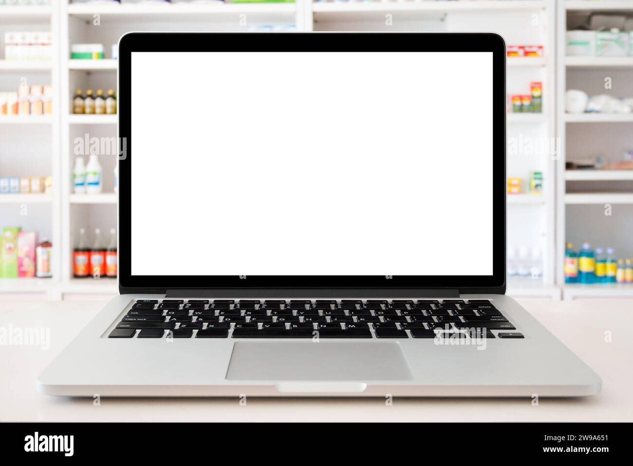 pharmacy store with laptop computer on medical counter Stock Photo - Alamy