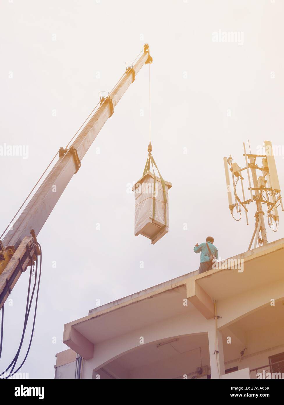 Loader lifting cranes hi-res stock photography and images - Alamy