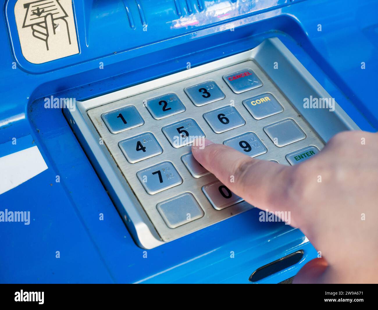 Woman using atm machine hi-res stock photography and images - Alamy