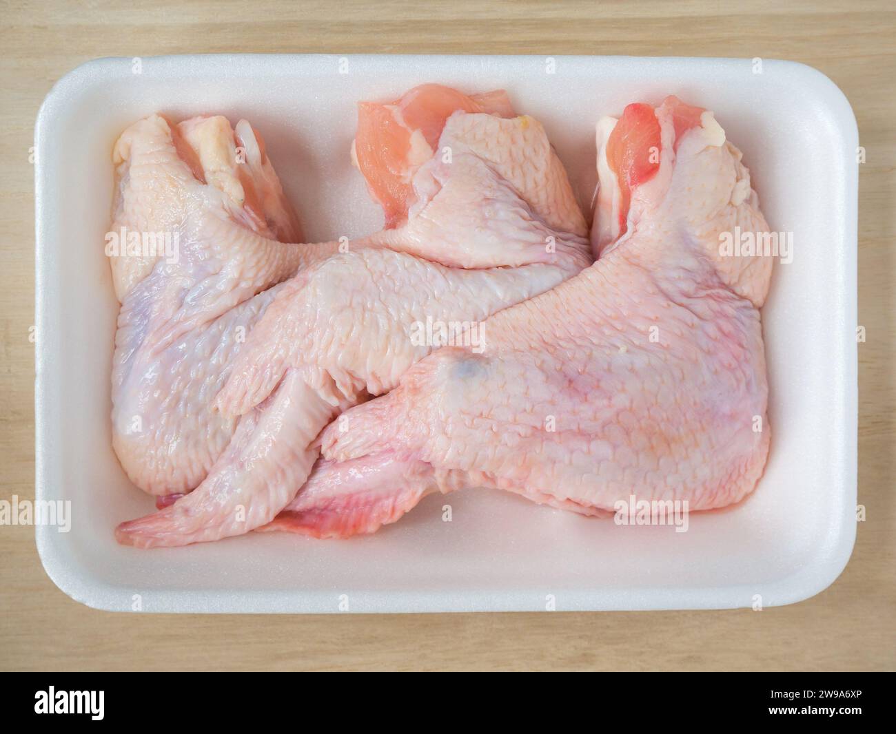 Fresh raw chicken wings on hi-res stock photography and images - Alamy