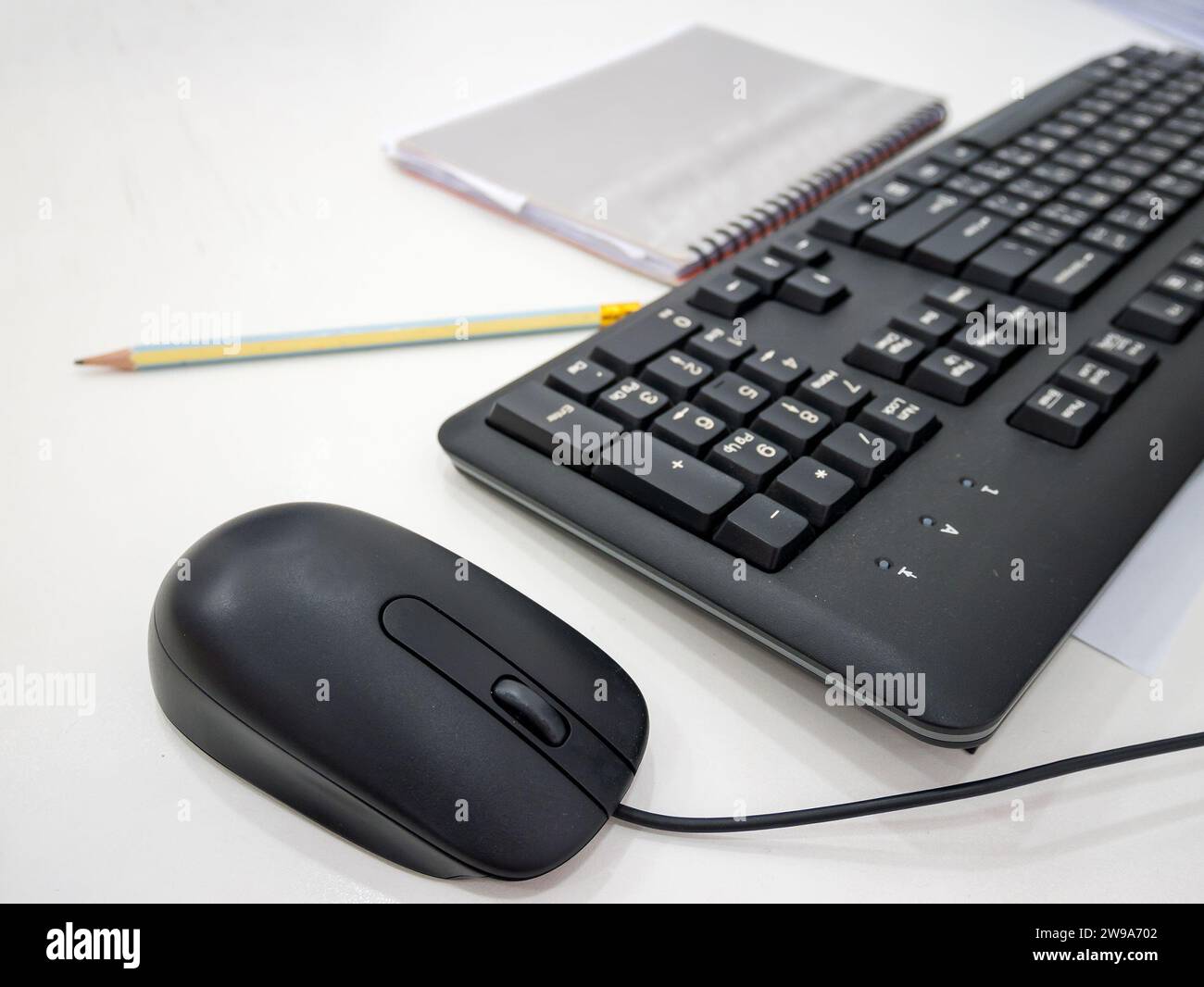 Office workplace with computer, pencil and notebook on office desk ...