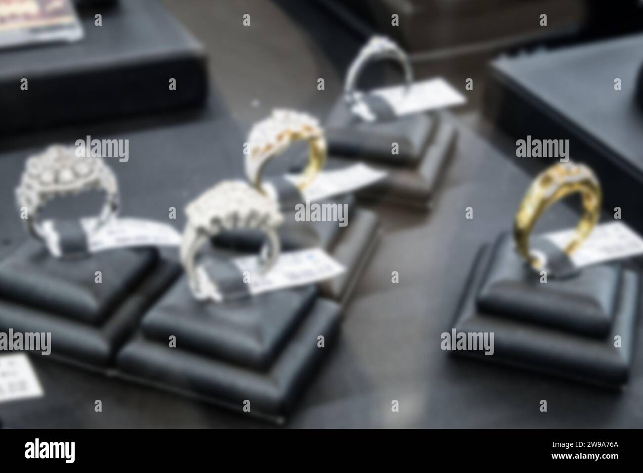 Luxury diamond rings in jewelry shop window display Stock Photo - Alamy