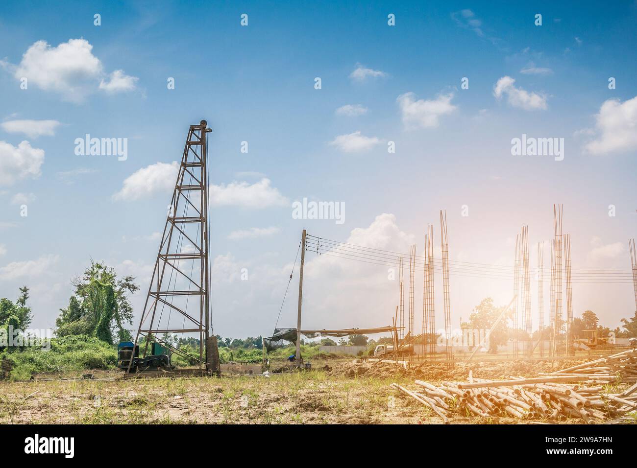pile driver at house building construction site Stock Photo - Alamy