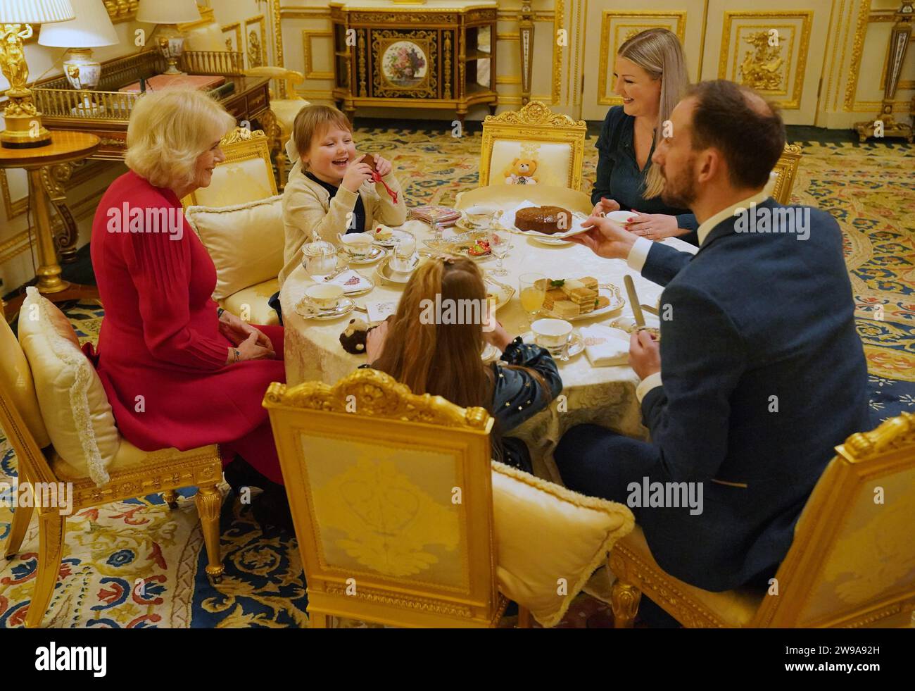 Queen Camilla Takes Tea With Seven Year Old Olivia Taylor From Sidcup