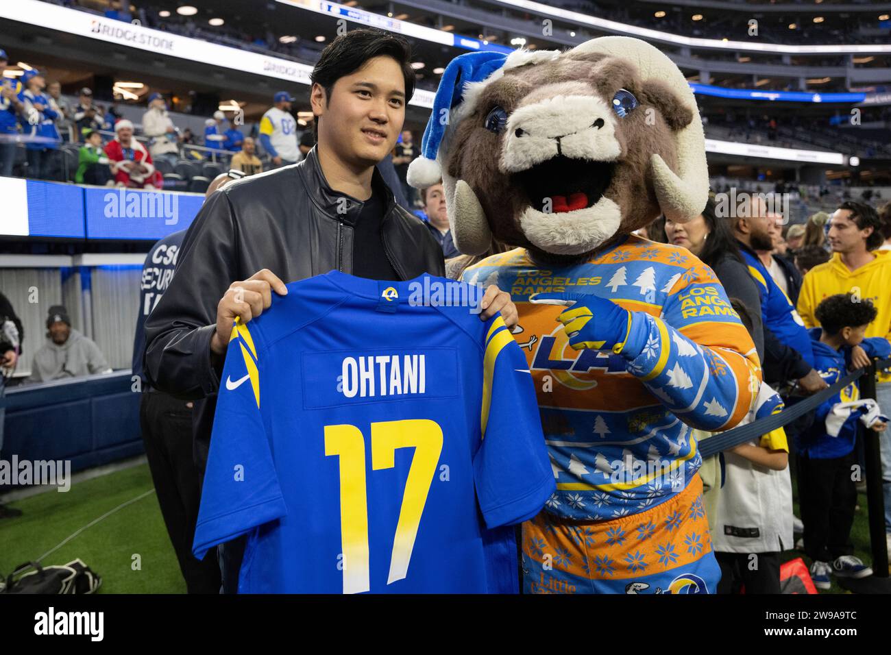 Los Angeles Dodgers' Shohei Ohtani, left, poses for a photo with Los ...