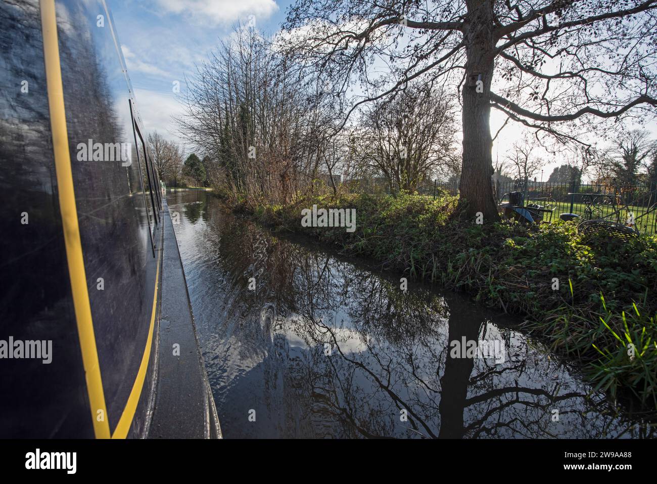 View from a narrowboat travelling in English rural countryside scenery ...