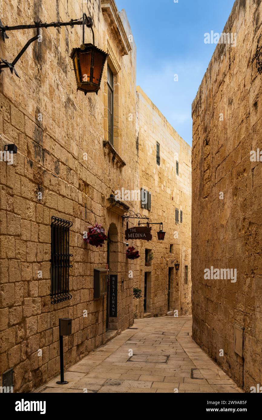 Mdina, Malta - 22 December, 2023: typical yellow-ochre limestone ...