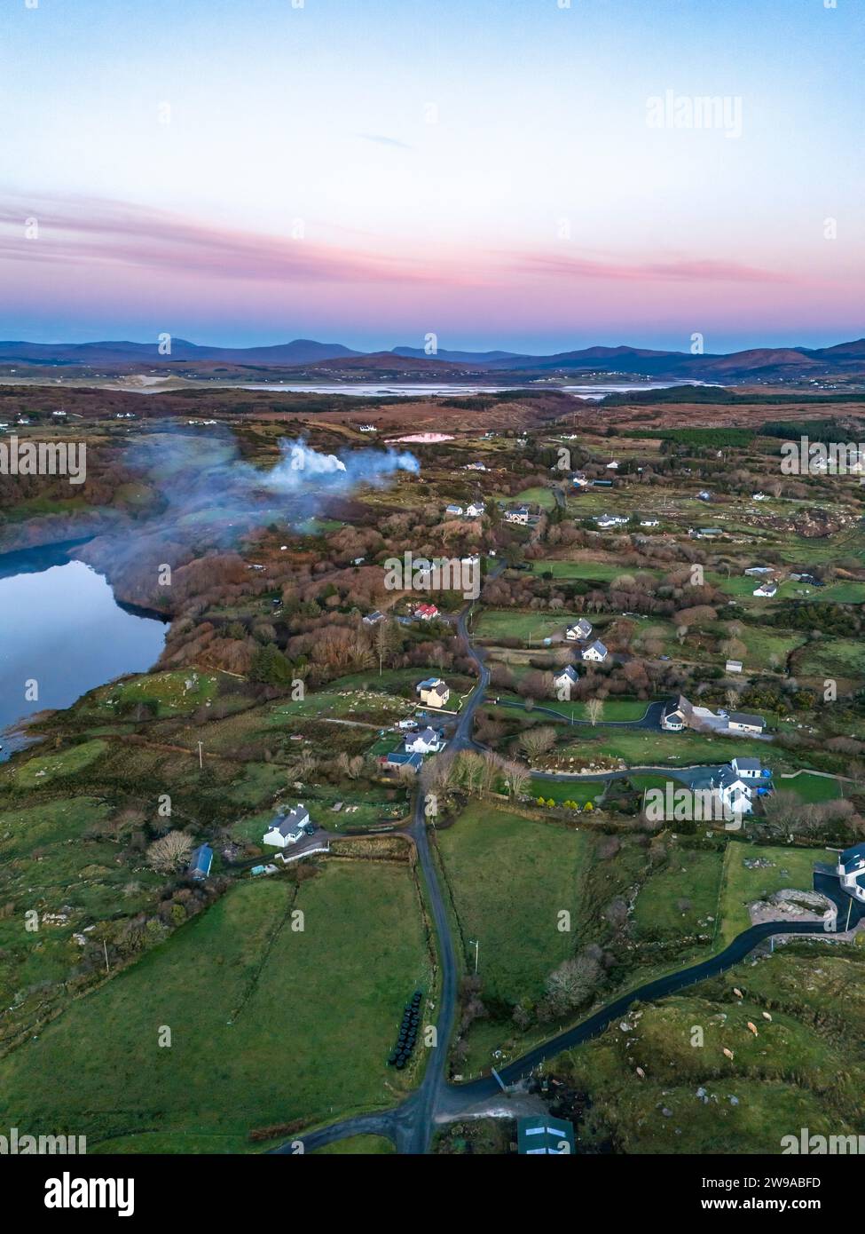 Smoke over Lough Fad due to traditionally burning of waste in rural ...