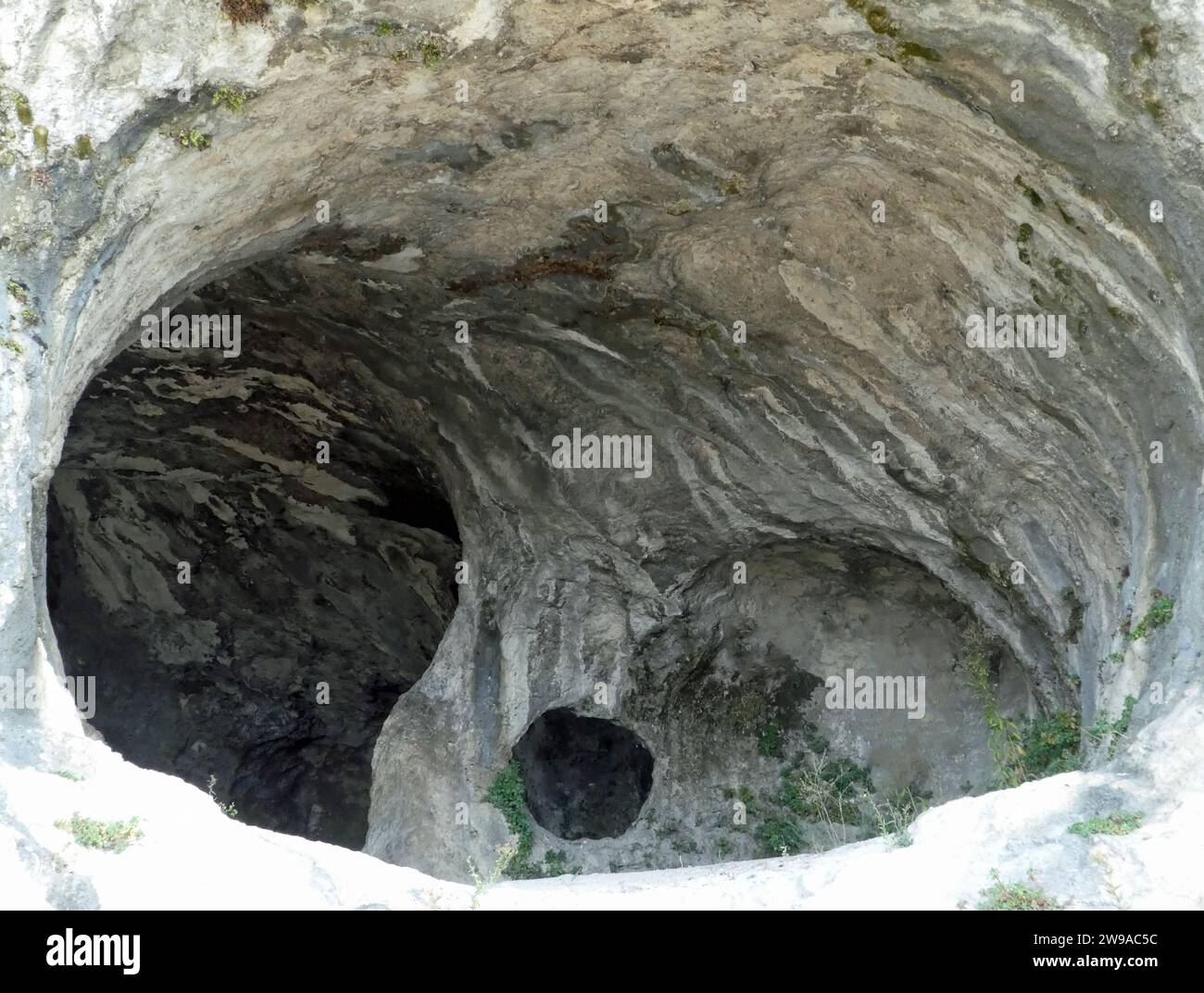 large caves dug inside the rocky mountain used in the prehistoric era ...
