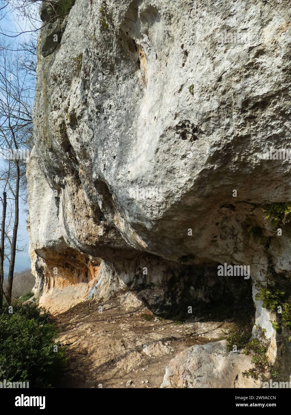 small caves dug into the rock used in prehistoric times as shelter for ...