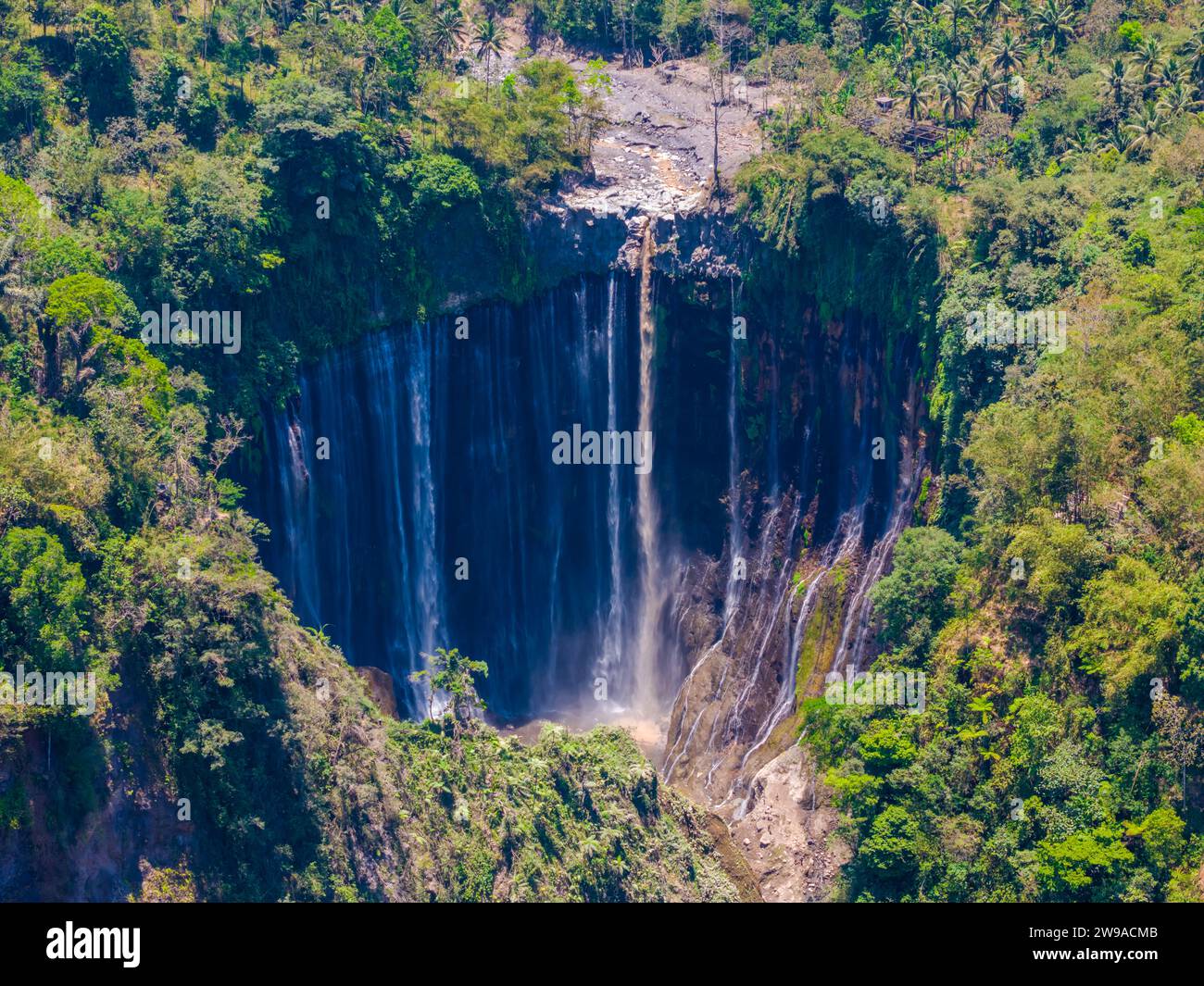 Aerial view from above, stunning view of Tumpak Sewu waterfall with ...