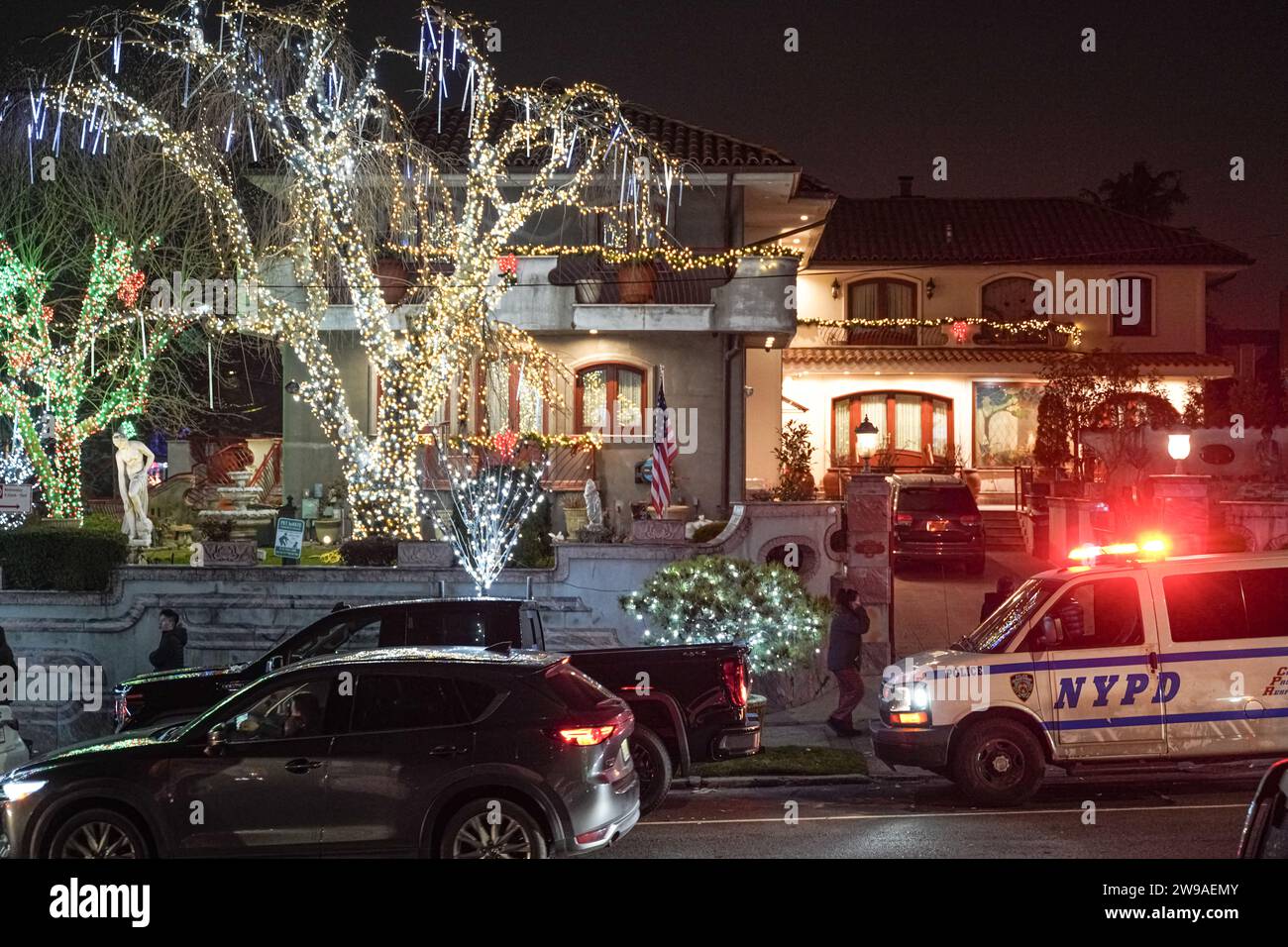 A cop car from the New York Police Department (NYPD) is parked in front ...