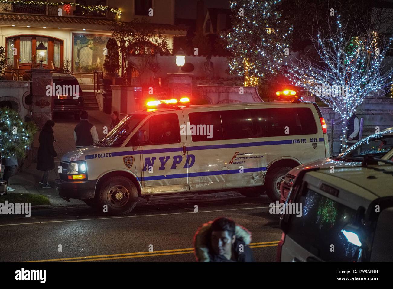 A cop car from the New York Police Department (NYPD) is parked in front ...