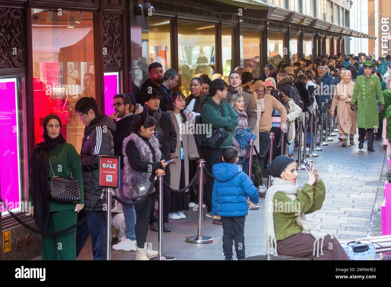 London, England, UK. 26th Dec, 2023. Customers are seen in queue ...