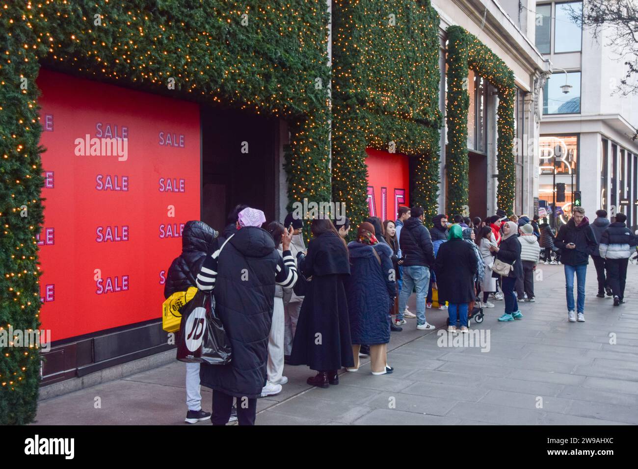 London, England, UK. 26th Dec, 2023. Customers queue outside Selfridges ...