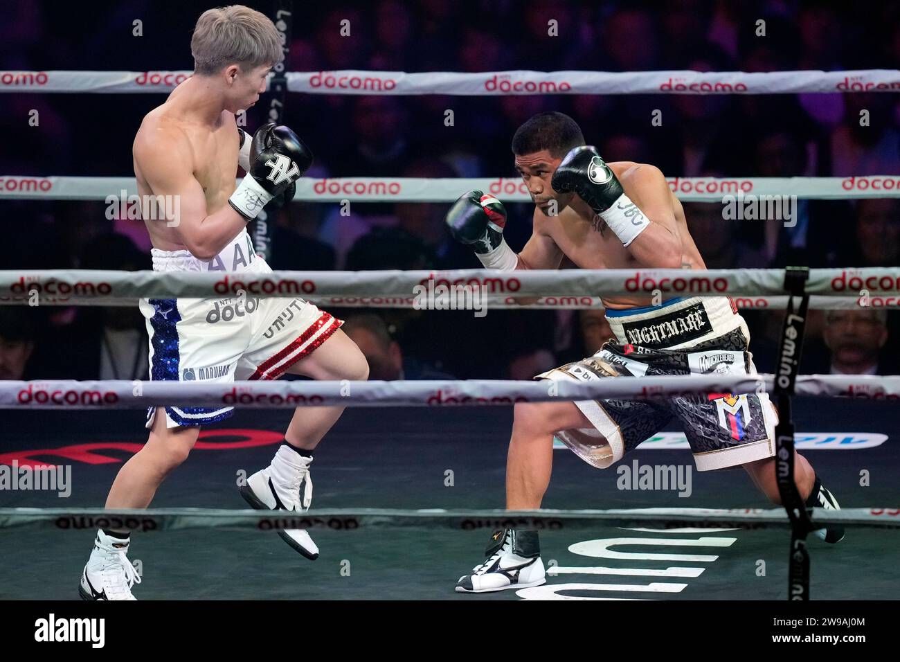 Naoya Inoue of Japan, left, and Marlon Tapales of the Philippines ...