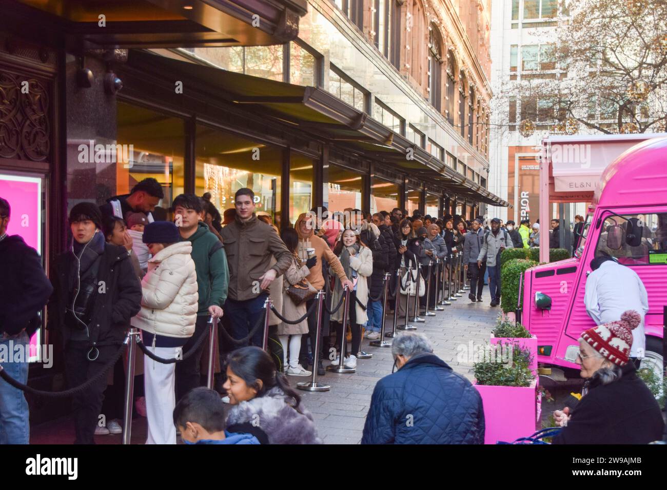 London, England, UK. 26th Dec, 2023. Customers queue outside Harrods in ...