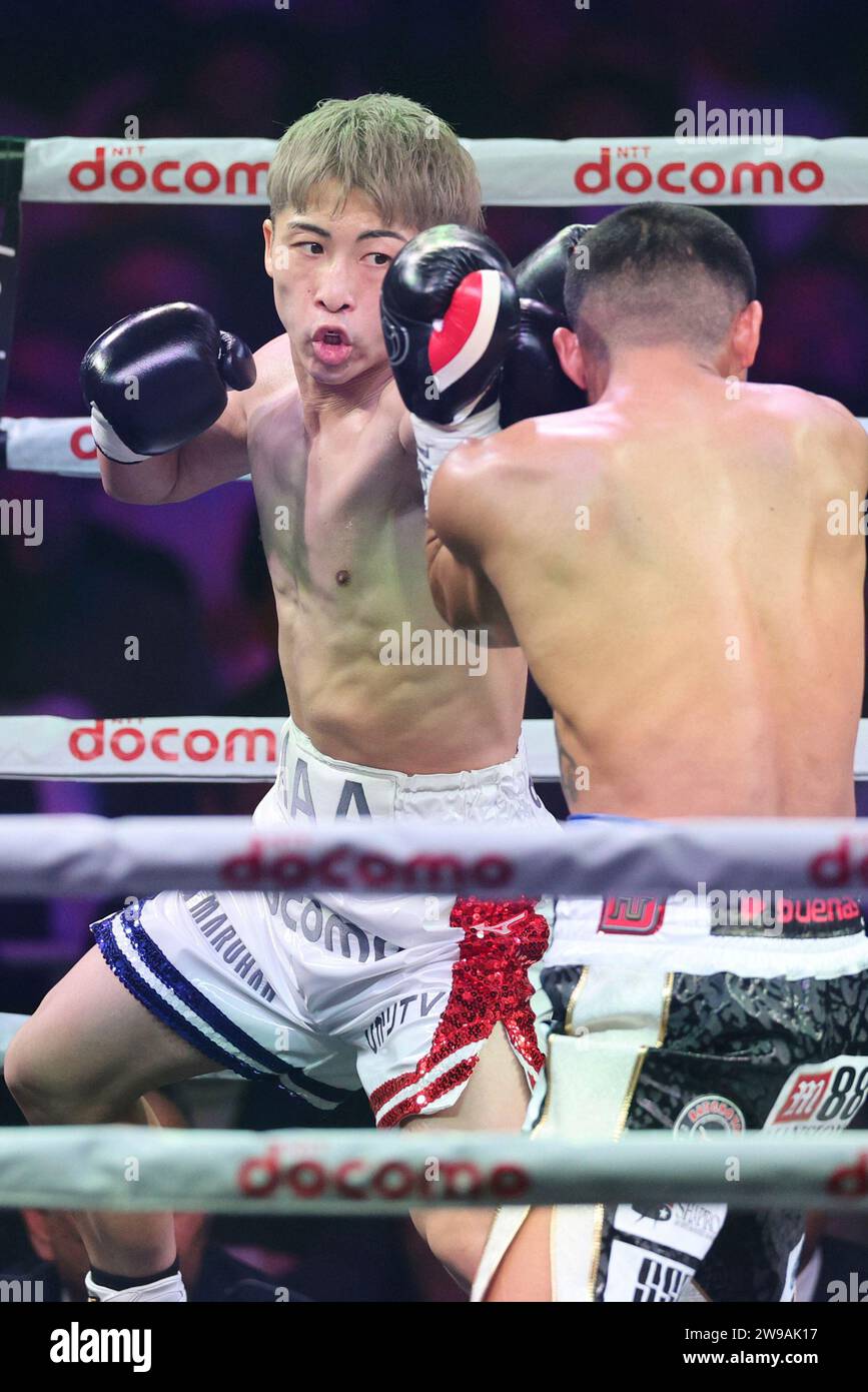 Japanese sensation Naoya Inoue (L) delivers a punch against Marlon ...