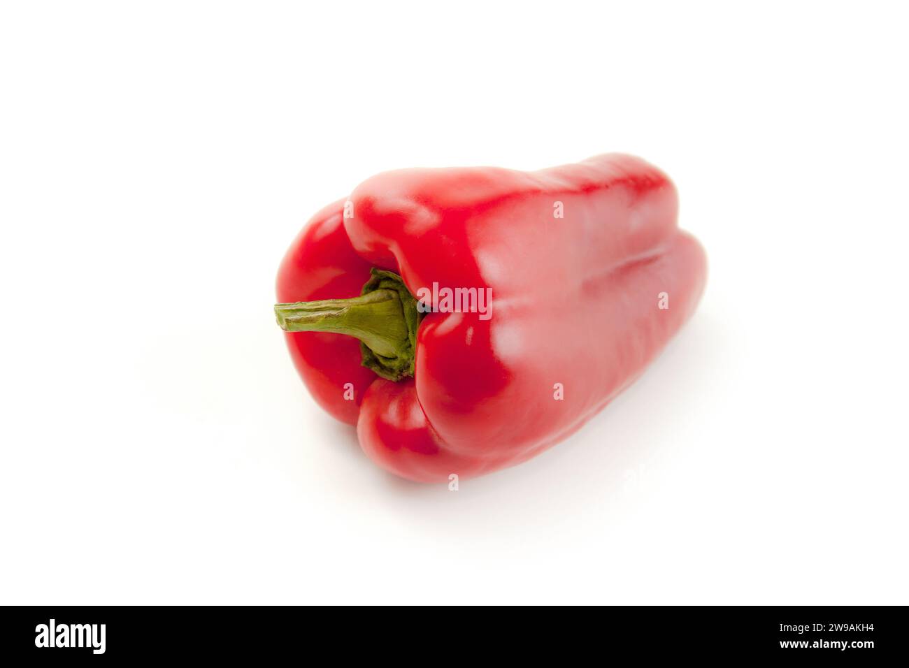 Whole red bell pepper (capsicum) known as sweet bell pepper, paprika ...